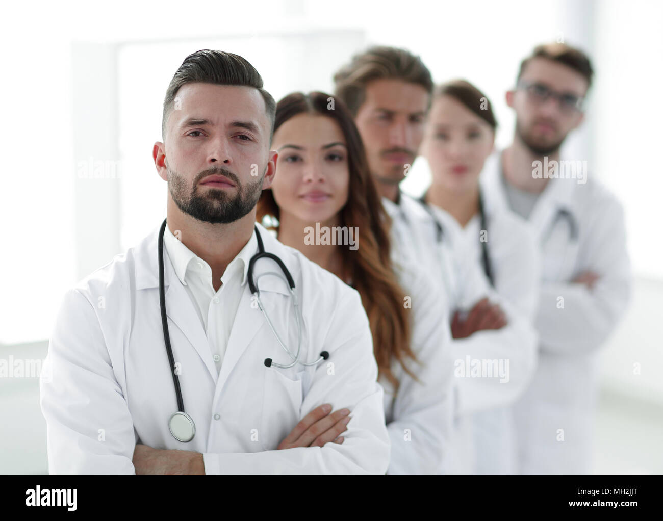 Portrait of medical team standing together Stock Photo - Alamy