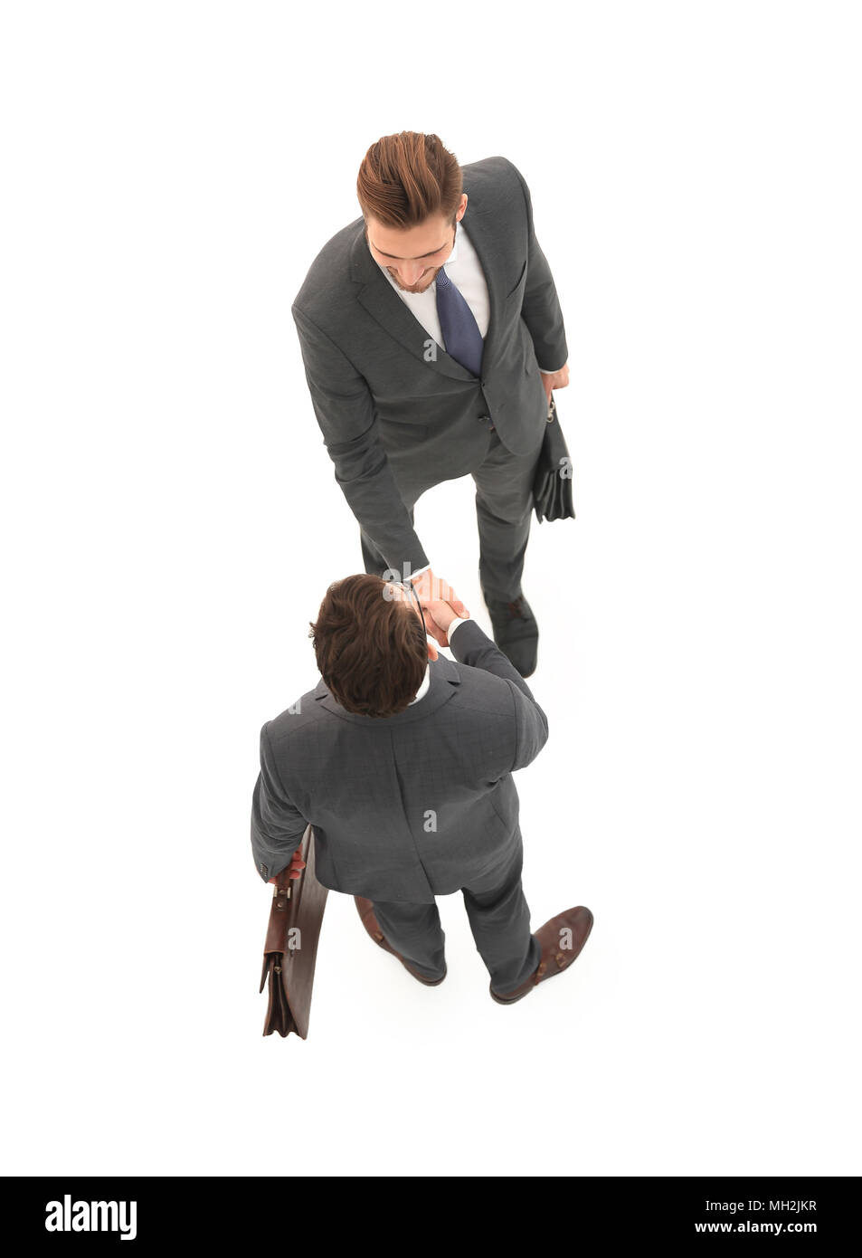 top view.the handshake business partners Stock Photo - Alamy