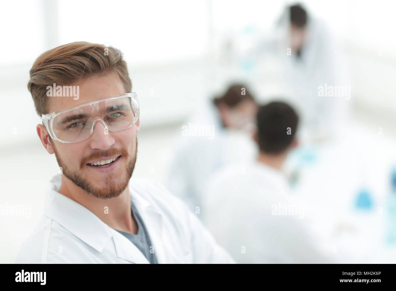 modern scientist on laboratory background Stock Photo - Alamy