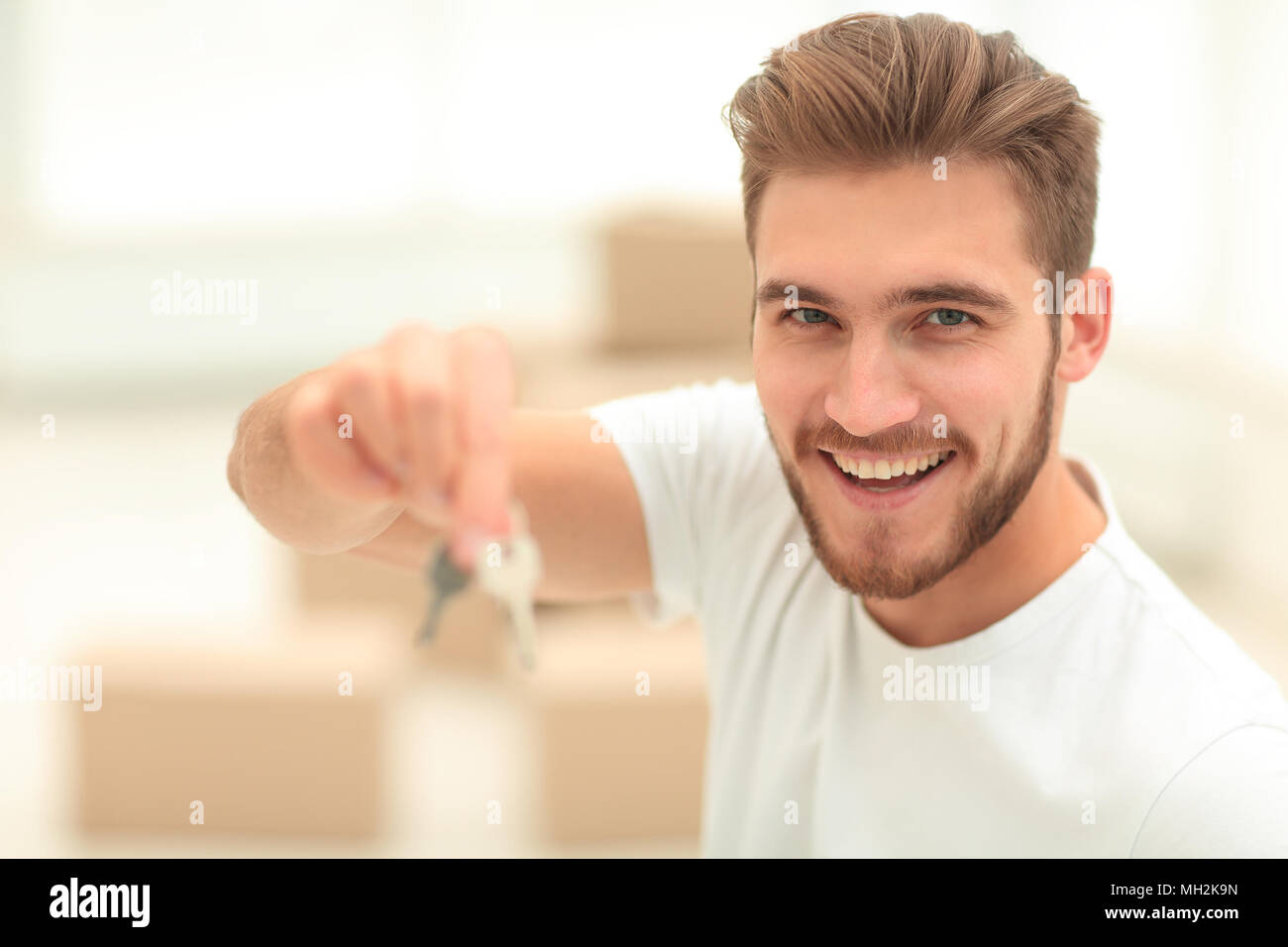 closeup.happy the man with the keys to new apartments Stock Photo - Alamy