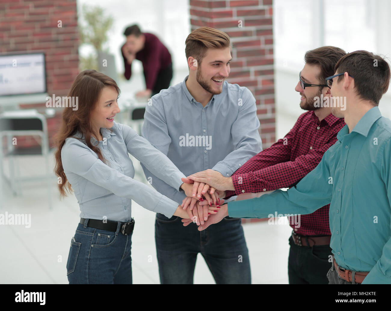 Group of people hands together partnership teamwork Stock Photo - Alamy