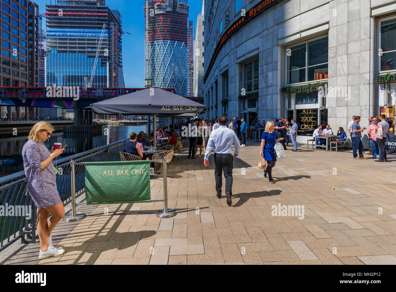 LONDON, UNITED KINGDOM - APRIL 20: View of a riverside promenade with ...