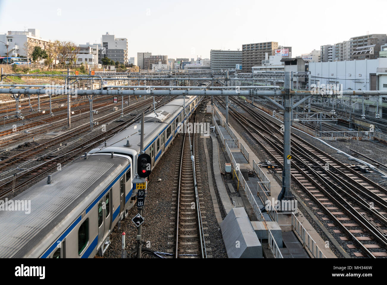 Railway tracks and passenger train in Tokyo, Japan Stock Photo - Alamy