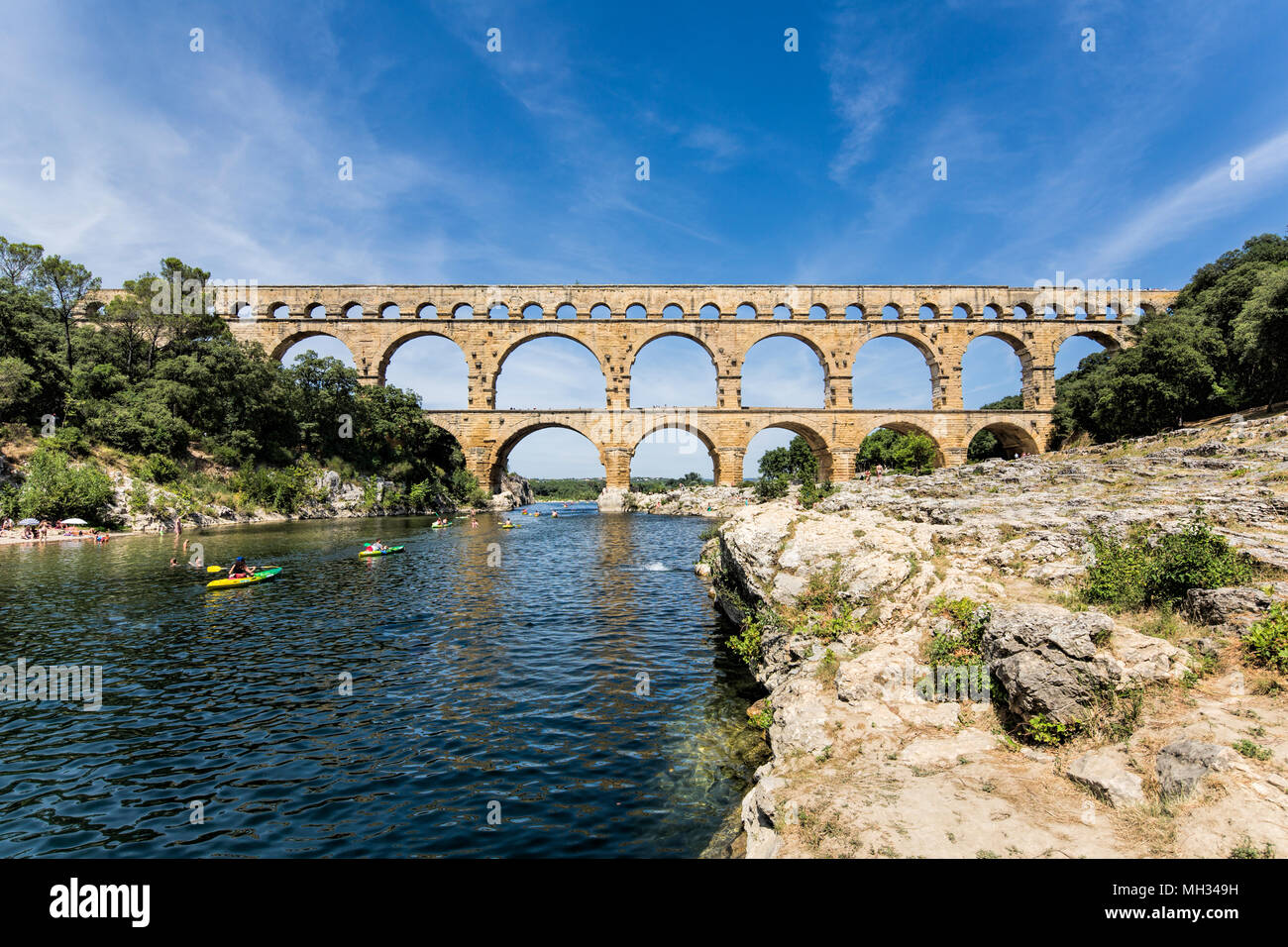 Kayaking under the three tiered Roman aqueduct over the river Gardon ...