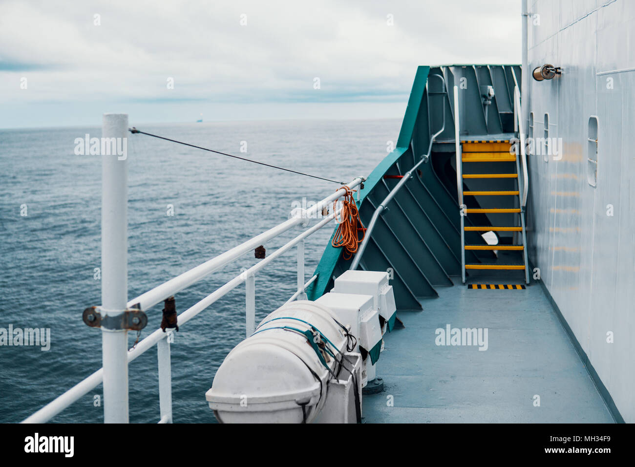 Front view of ocean boat or vessel sailing through calm sea. Freedom ...