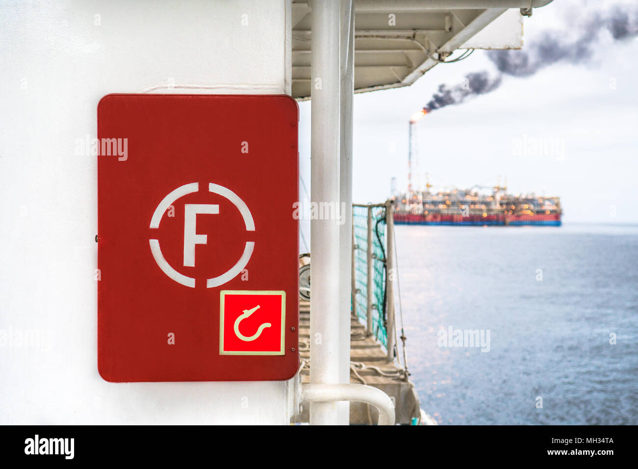 Fire prevention onboard vessel at sea. Fire cabinet with fire equipment ...