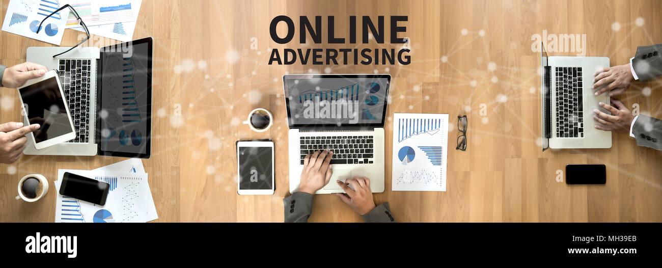 ONLINE ADVERTISING Business team work with financial reports banner ...