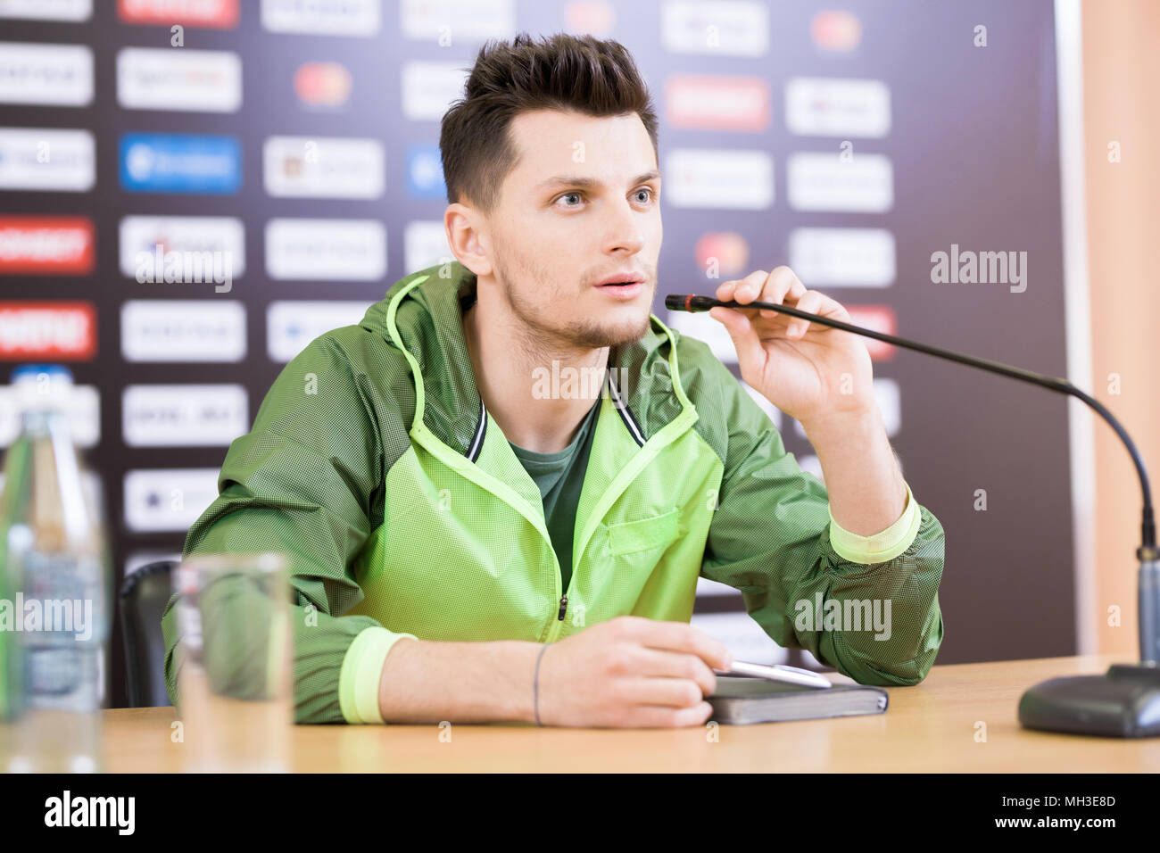 Young handsome man giving interview hi-res stock photography and images ...