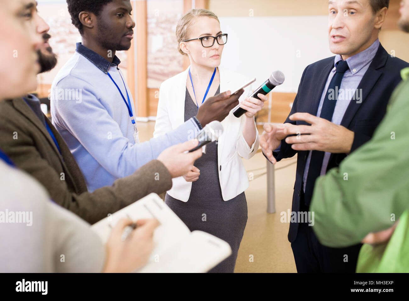 Group of Reporters Taking Interview Stock Photo - Alamy