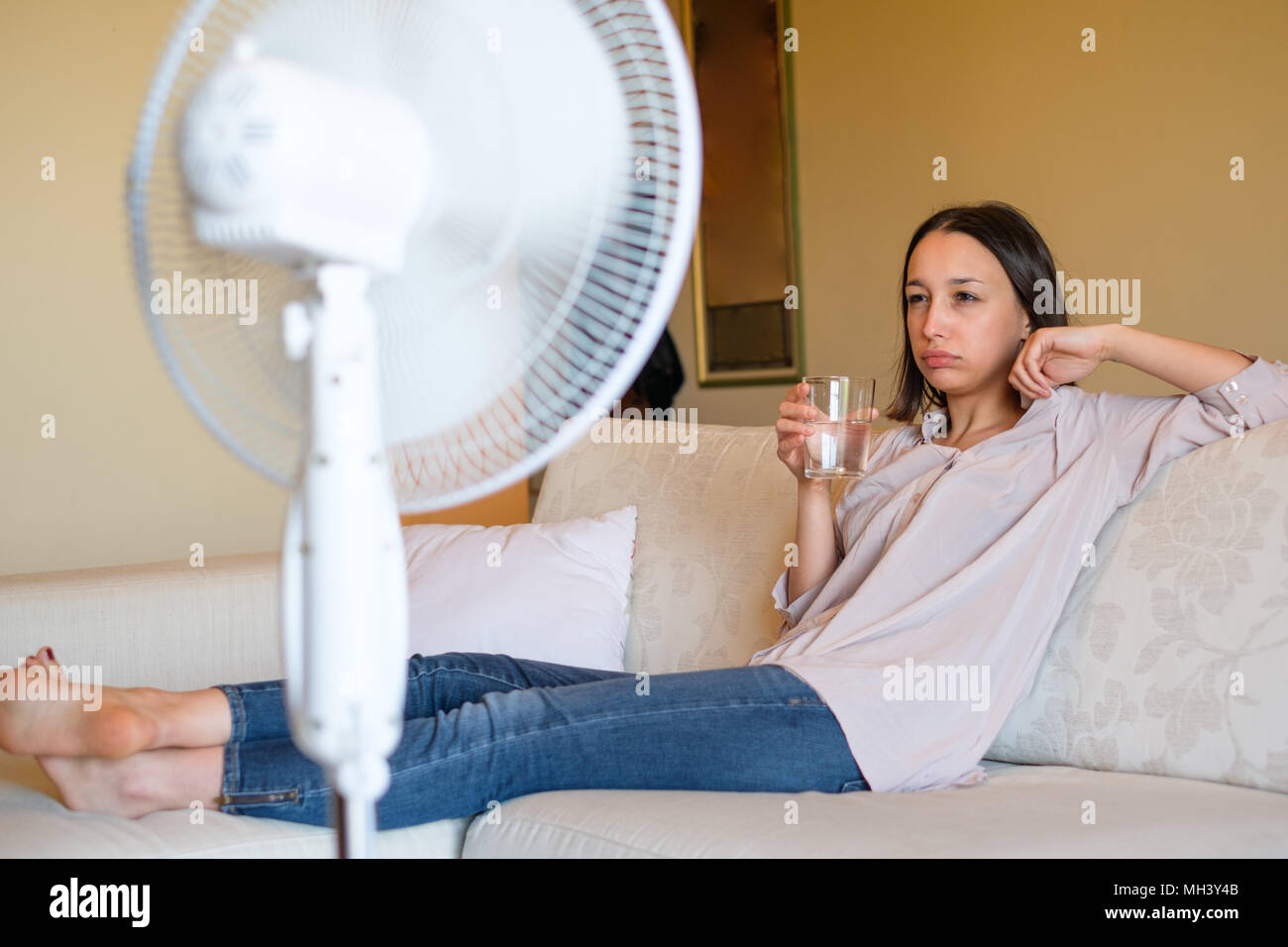 Woman and water cooler hi-res stock photography and images - Alamy