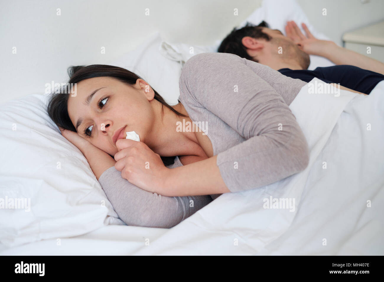 Crying woman bedroom hi-res stock photography and images - Alamy