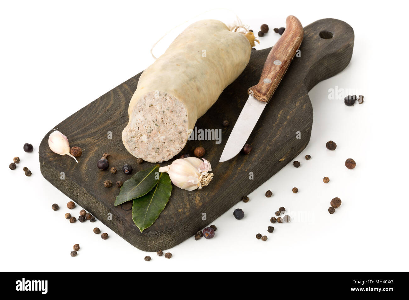 German specialty liverwurst (Leberwurst) with spices on wooden board ...