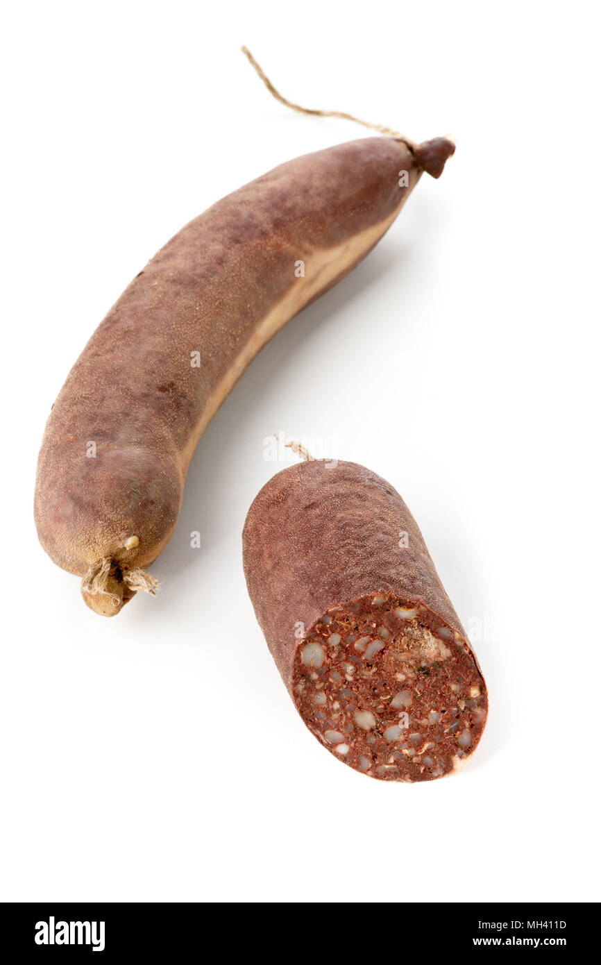 German specialty blood sausage (Blutwurst) whole and sliced over white ...