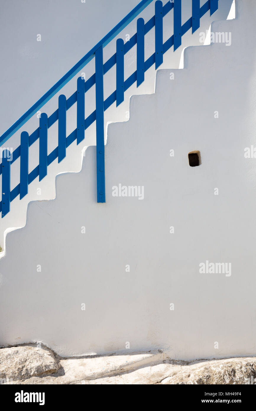 blue railing on whitewashed building in Greece Stock Photo - Alamy
