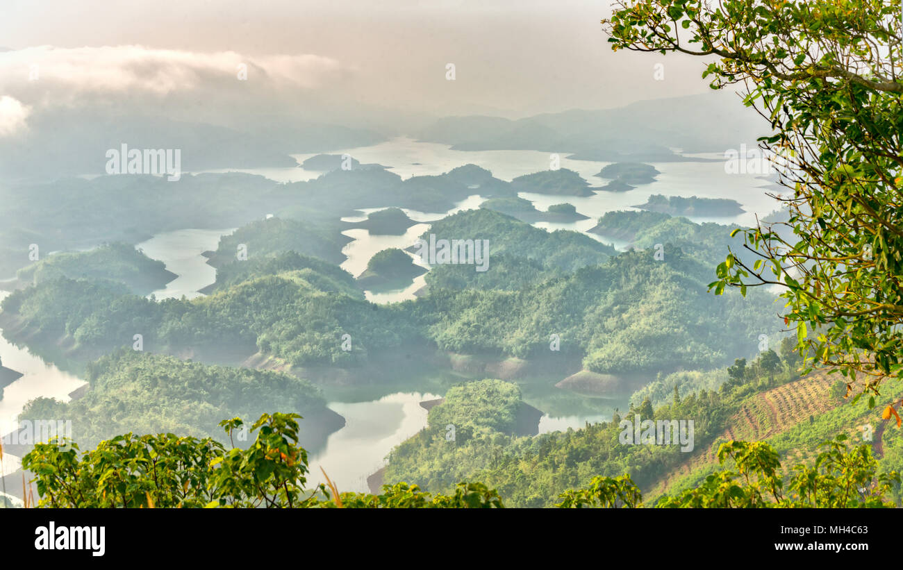 Ta Dung lake in the morning when the sun rises at the top of mountain ...