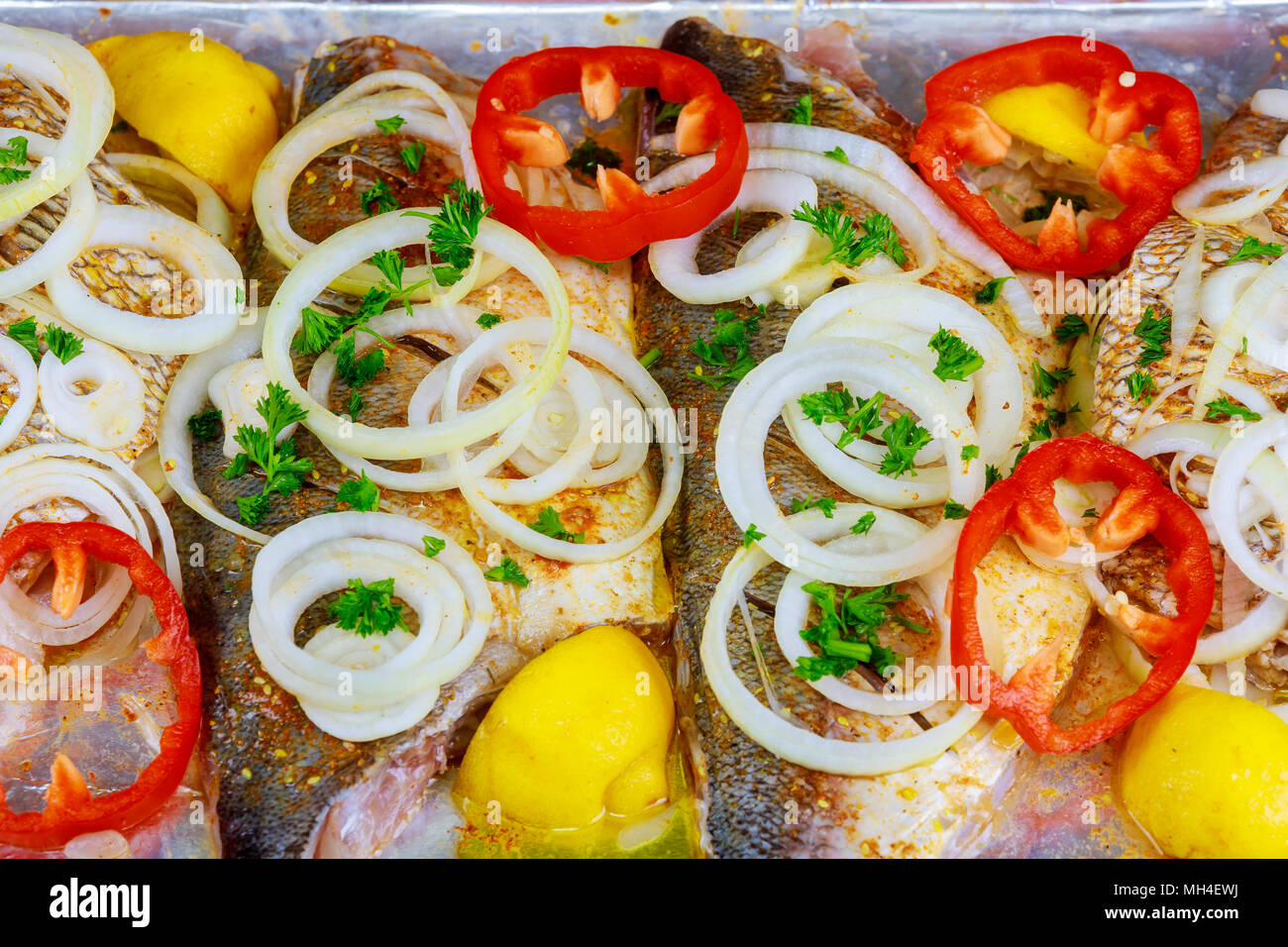 Raw dorado fish ready hi-res stock photography and images - Alamy
