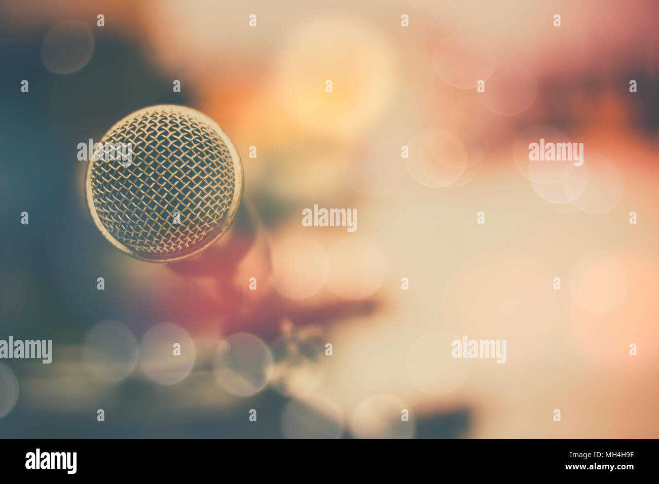 microphone and bokeh background, concept as music instrument in studio ...