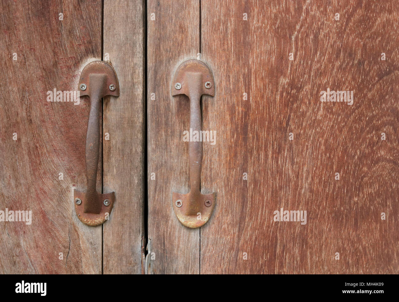 old wood door or window with grunge Handles Stock Photo - Alamy