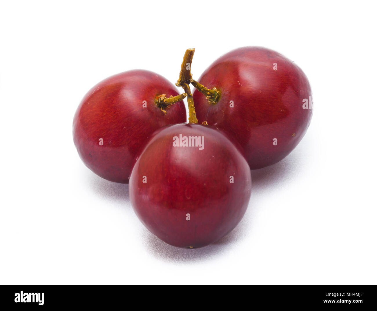 red grape isolated on white Stock Photo - Alamy