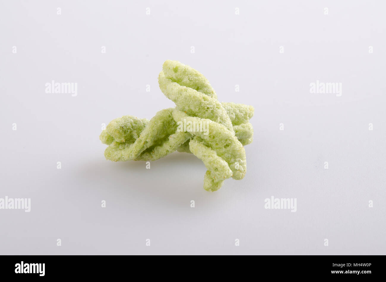 Junk food, green peas snack on a background Stock Photo - Alamy