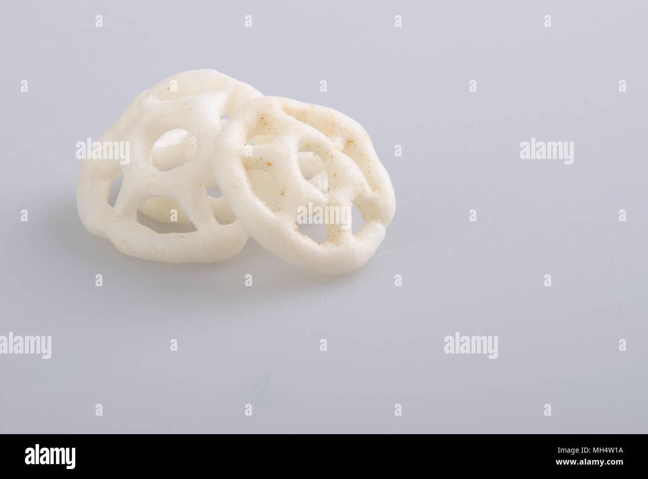 Junk food, potato ring on a background Stock Photo - Alamy