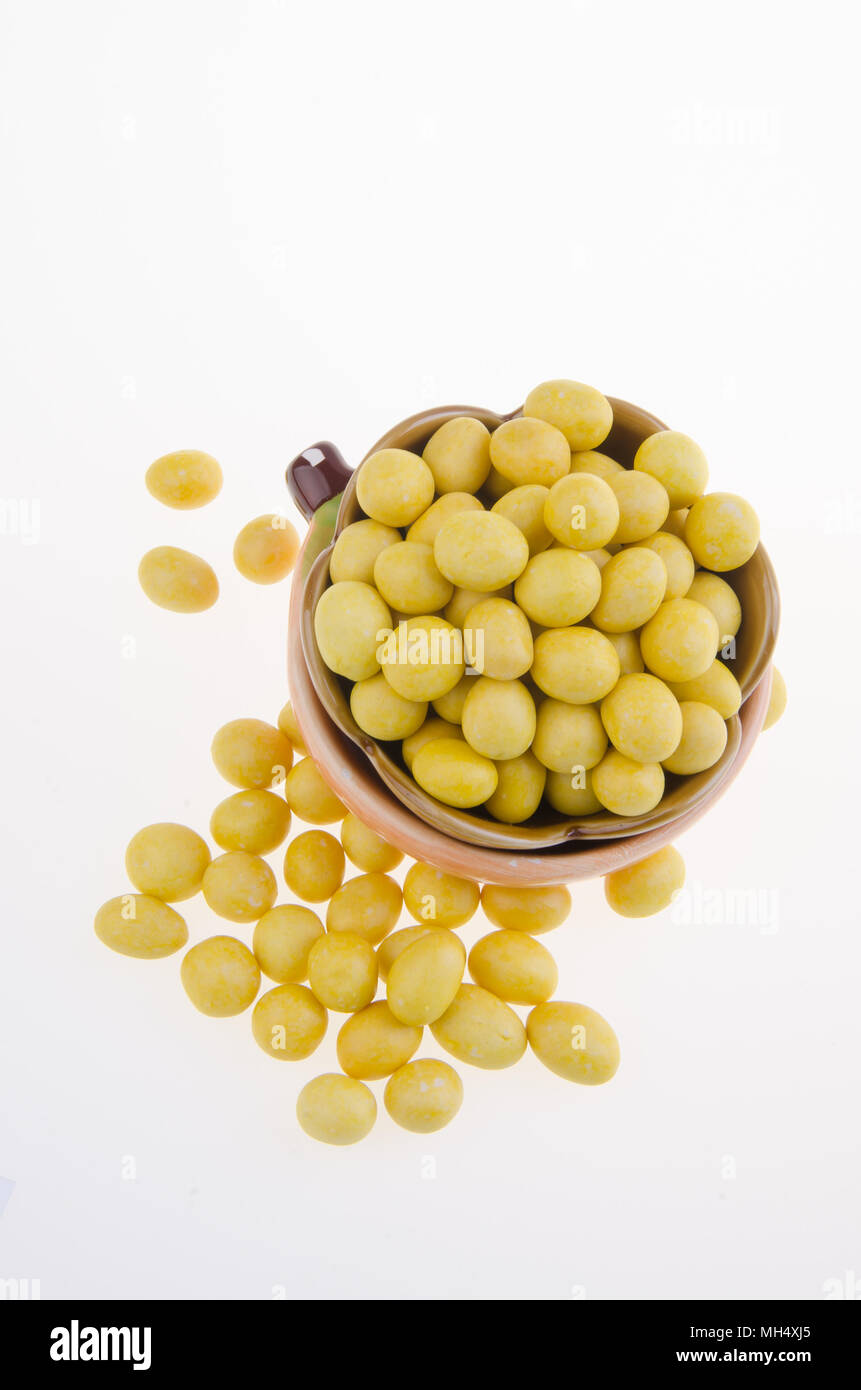 Peanutes or Crispy Coated Peanuts on background Stock Photo - Alamy