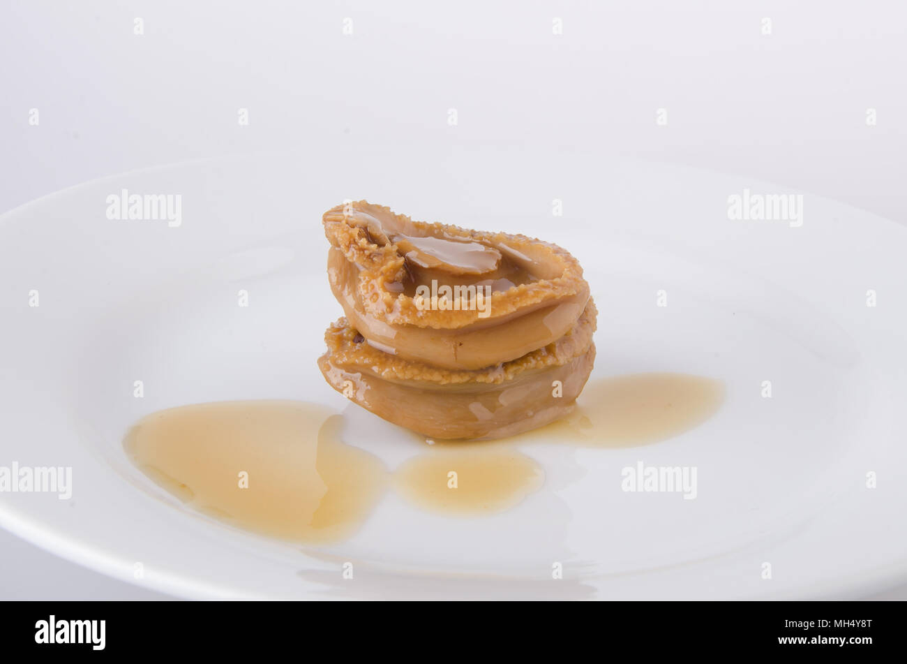 Abalones. Chinese cuisine abalone on the background Stock Photo - Alamy