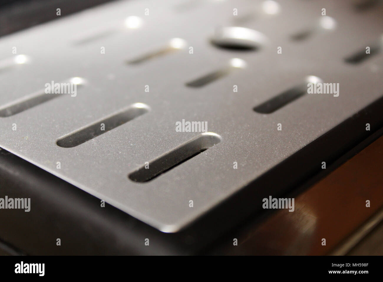 texture of drip tray cover on espresso machine Stock Photo - Alamy