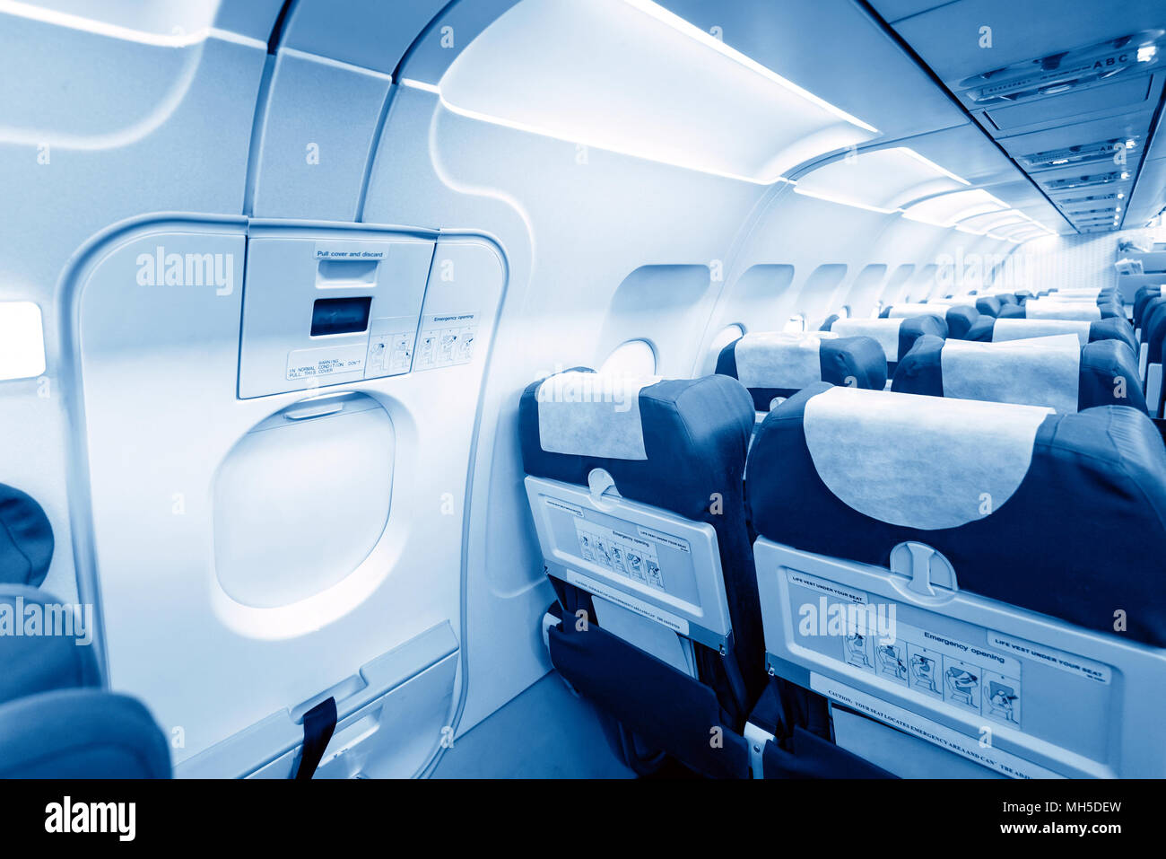 Empty aircraft seats and windows Stock Photo - Alamy