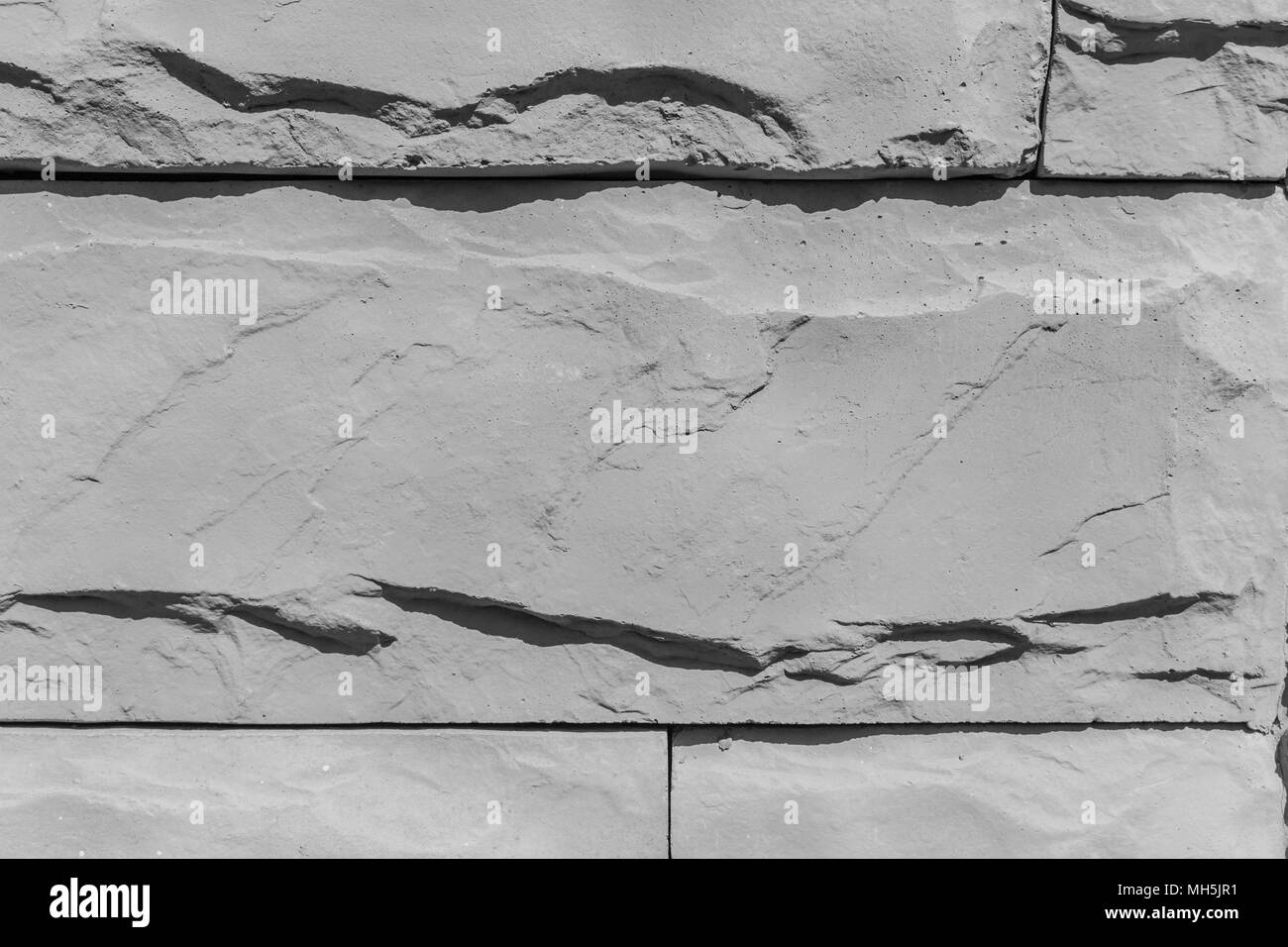 Brick wall with daytime natural light of background Stock Photo - Alamy