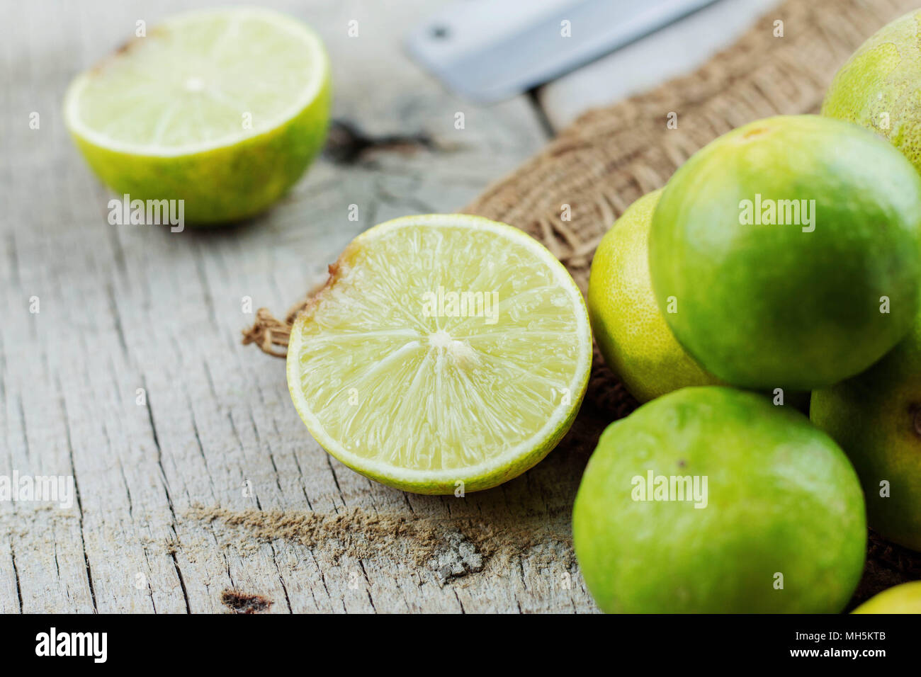Lemon slices cut on the old wooden floor Stock Photo - Alamy