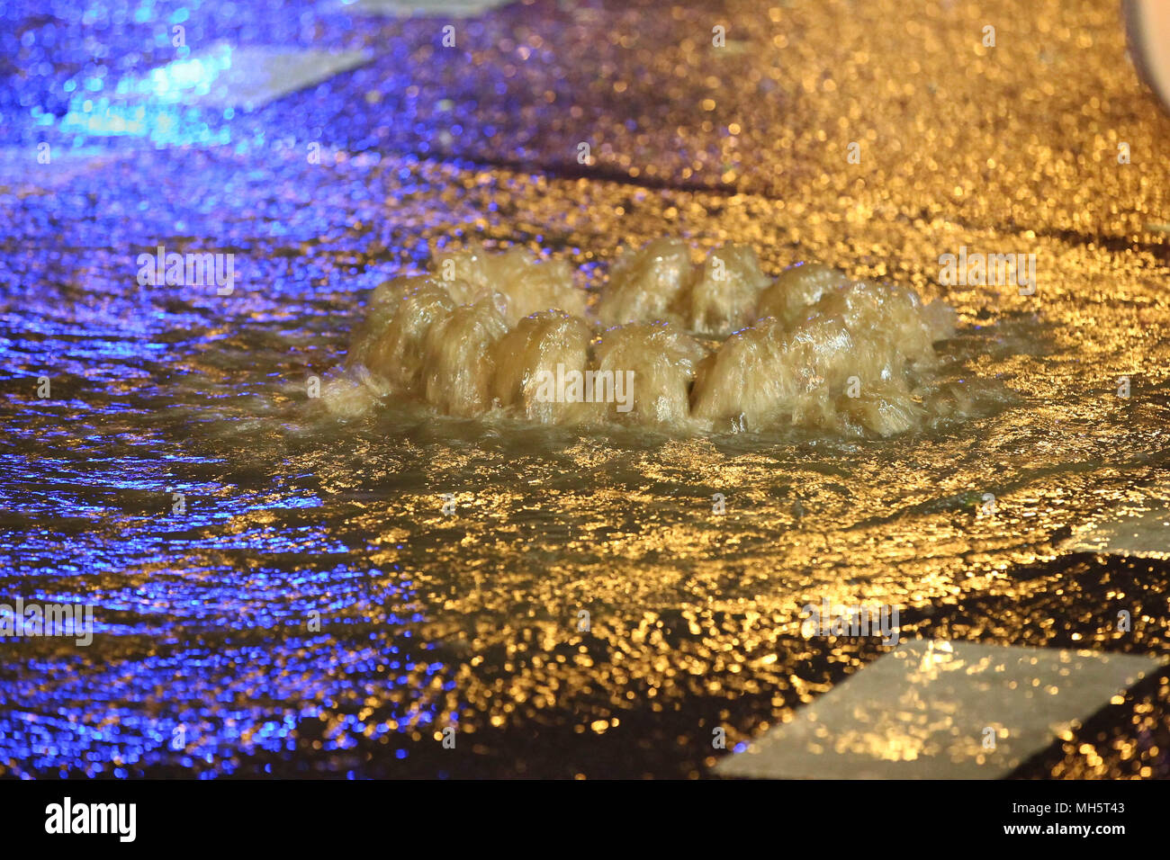 29 April 2018, Germany, Aachen: An overflowing gully. There were heavy ...