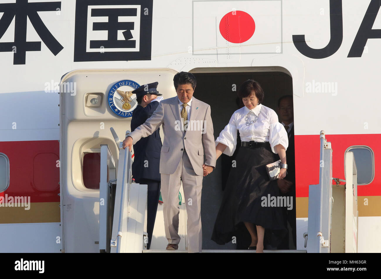 Japan's prime minister Shinzo Abe arrives with his wife Akie Abe at the ...