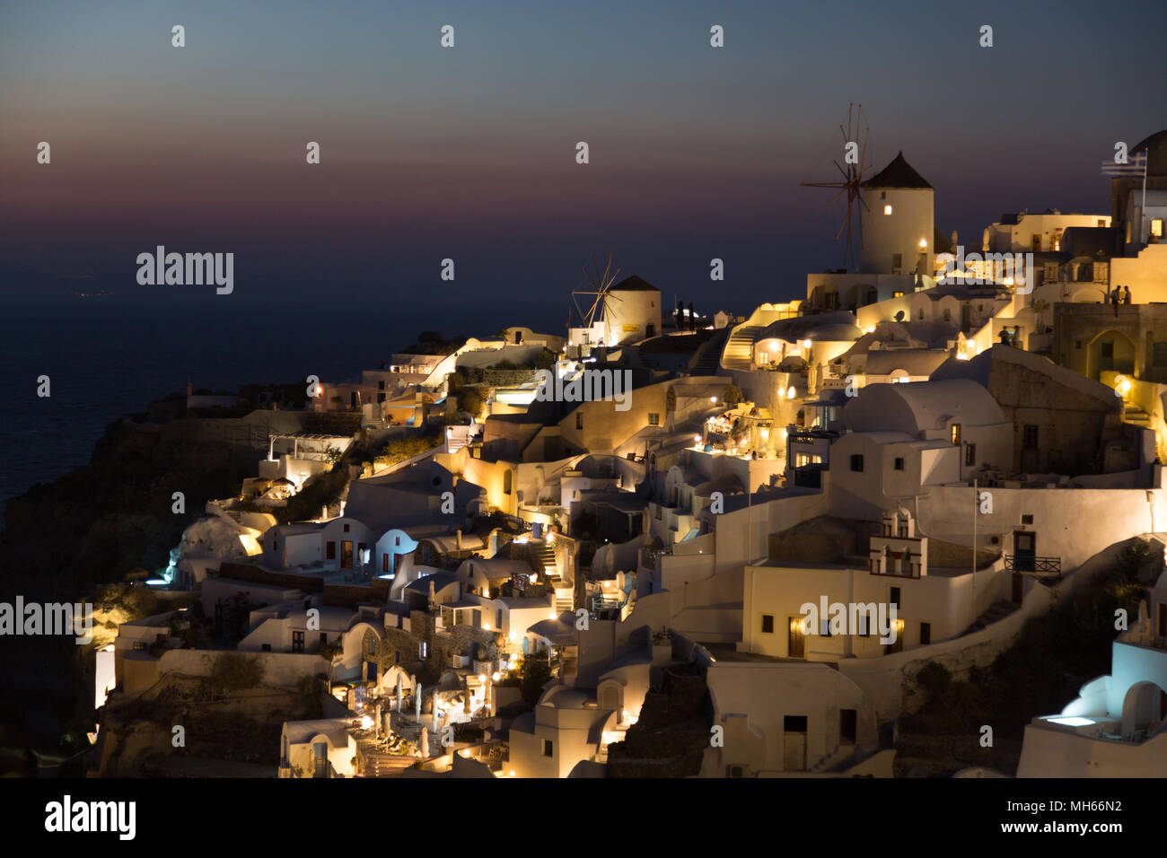 glowing buildings after sunset in Oia, Santorini Stock Photo - Alamy