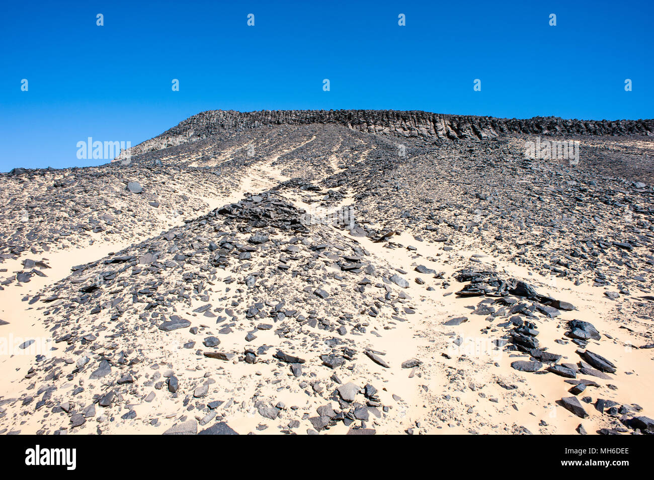 Black desert lanscape and basalt formarions Stock Photo - Alamy