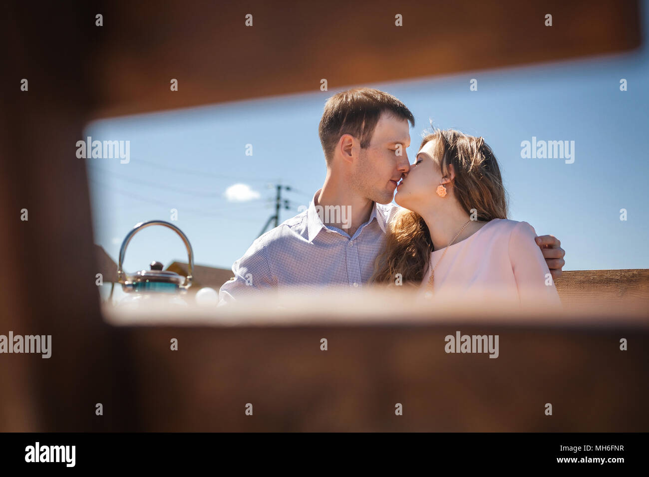couple kissing on terrace Stock Photo - Alamy