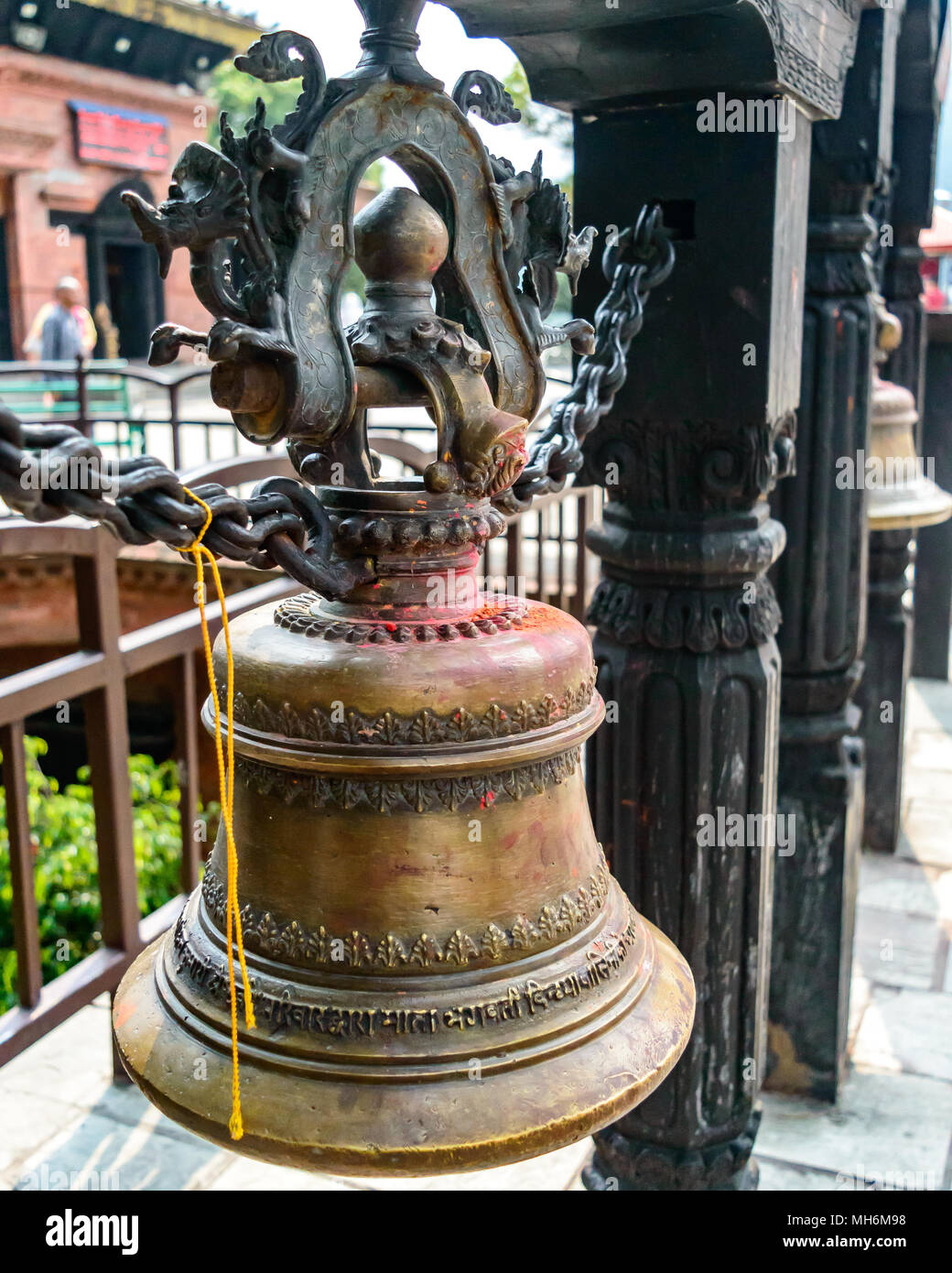 In Hinduism, bells are generally hung at the temple dome in front of ...