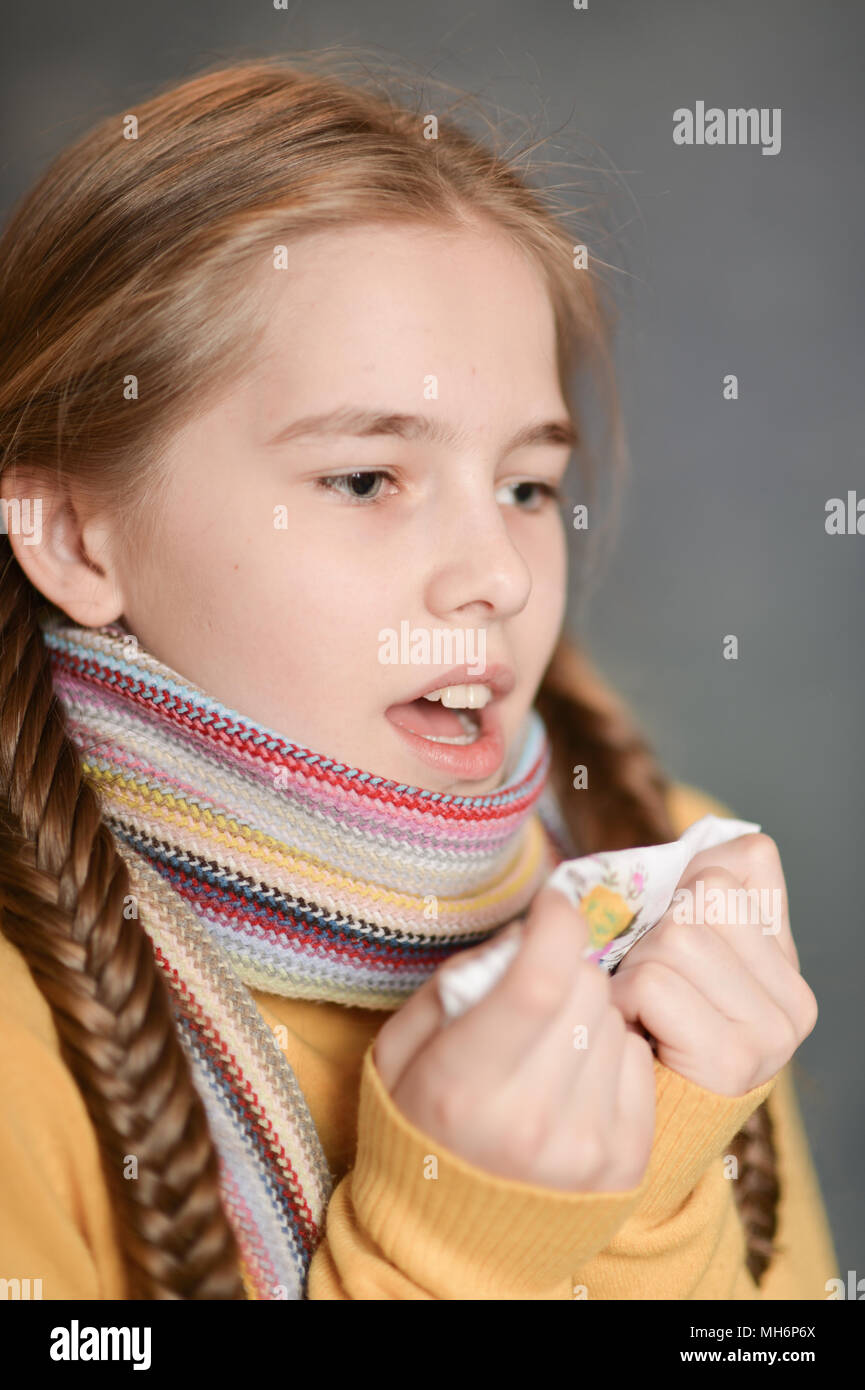 sick girl wearing scarf Stock Photo - Alamy