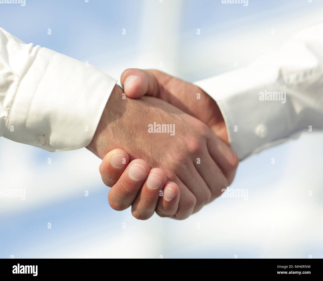 Close-up photo of handshake of two successful businessmen Stock Photo ... Close-up photo of handshake of two successful businessmen Stock Photo ...