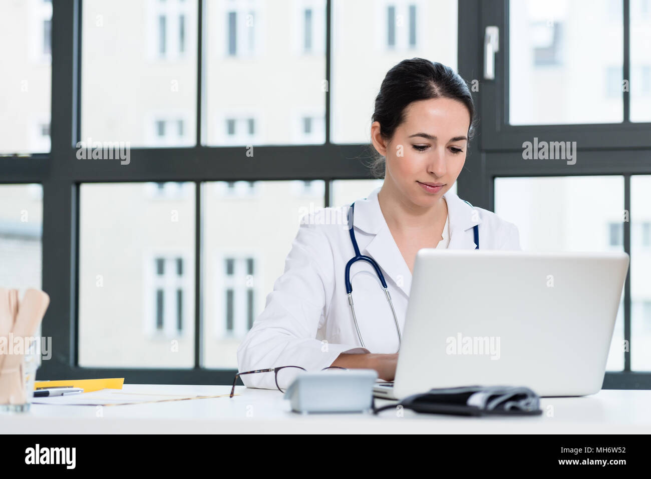 Doctor working office female hi-res stock photography and images - Alamy
