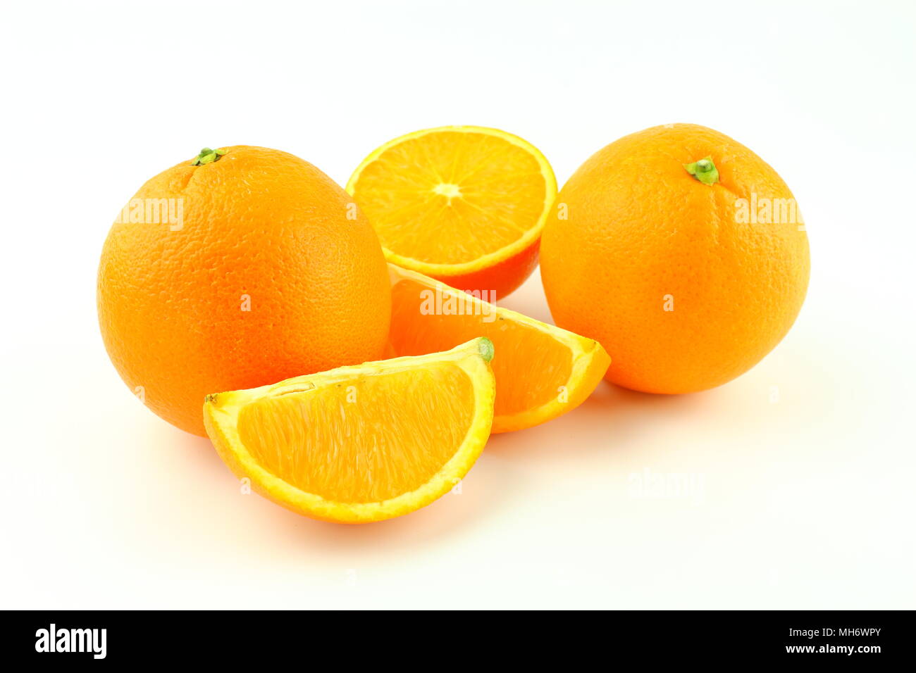 composition of fresh orange fruits isolated on a white background Stock ...