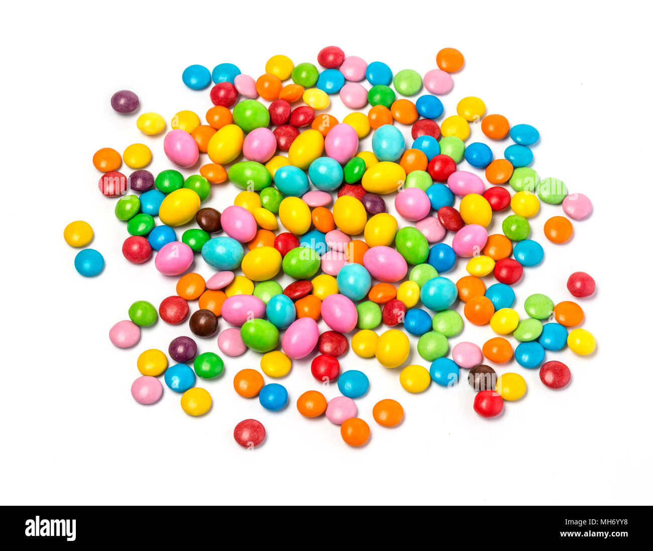 Colorful chocolate candy pills isolated on white background. Top view ...