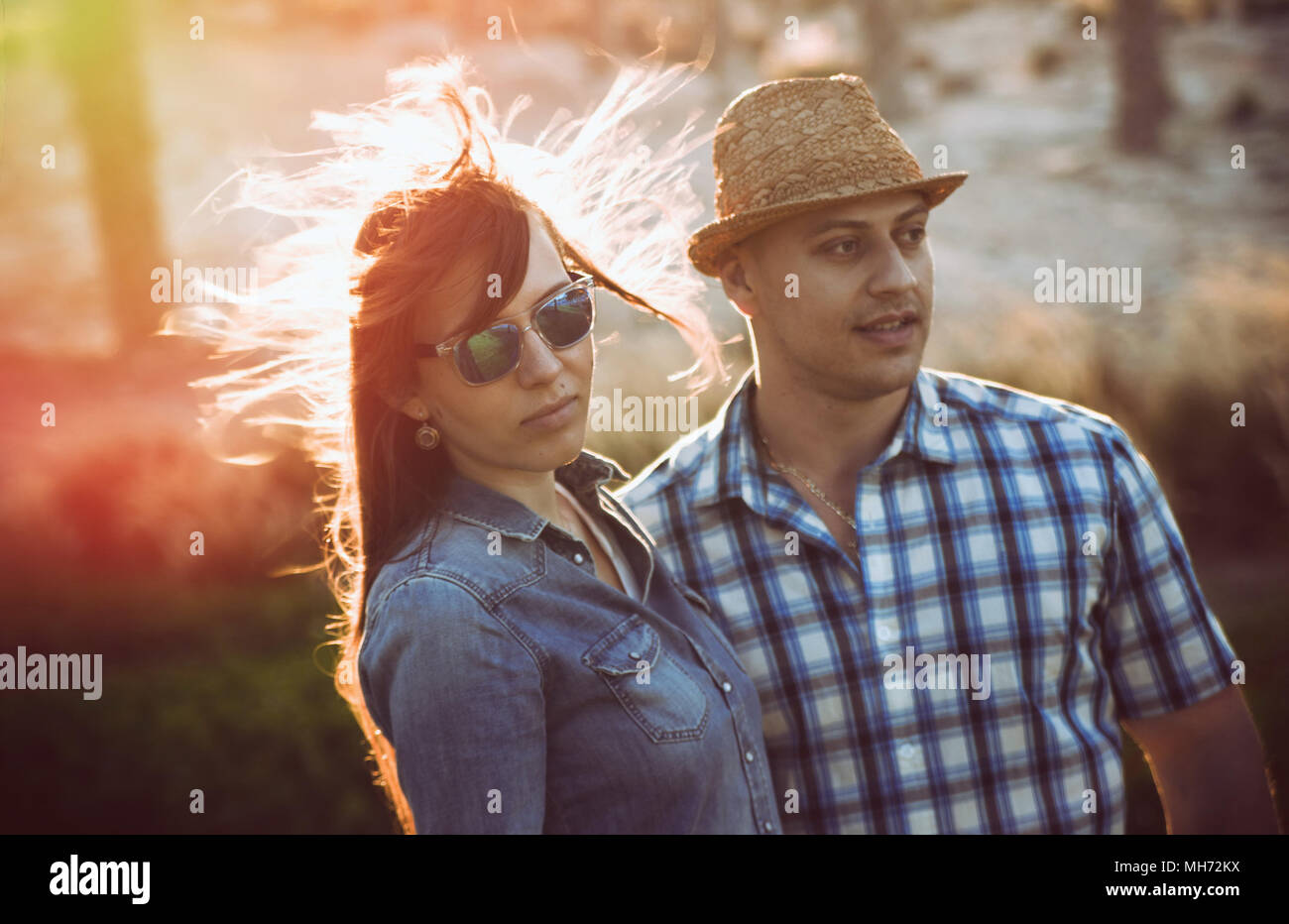 Happy couple in the sunlight Stock Photo - Alamy