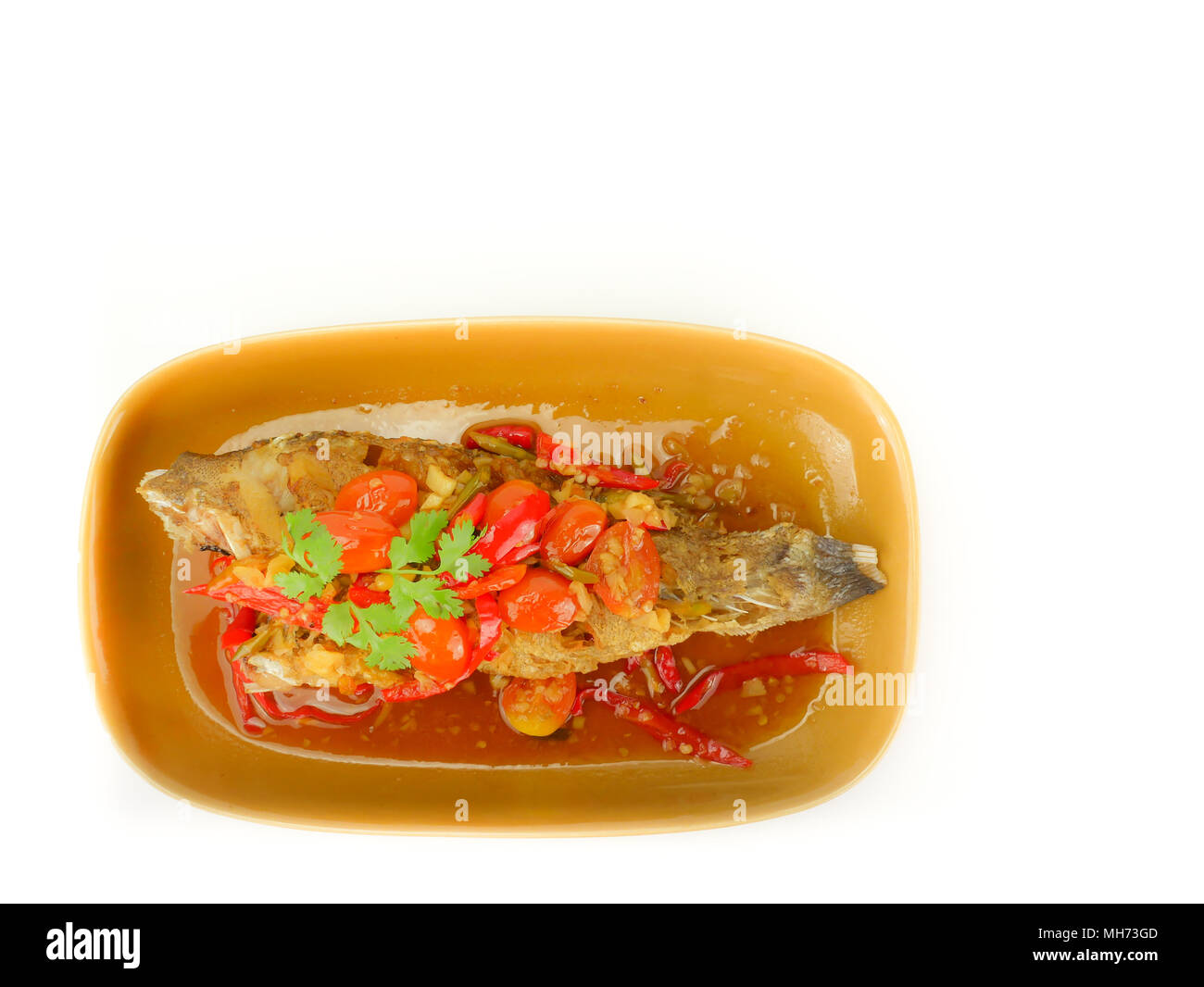 Deep Fried Fish with Chili Sauce (Pla Rad Prik) and herb topped on ...