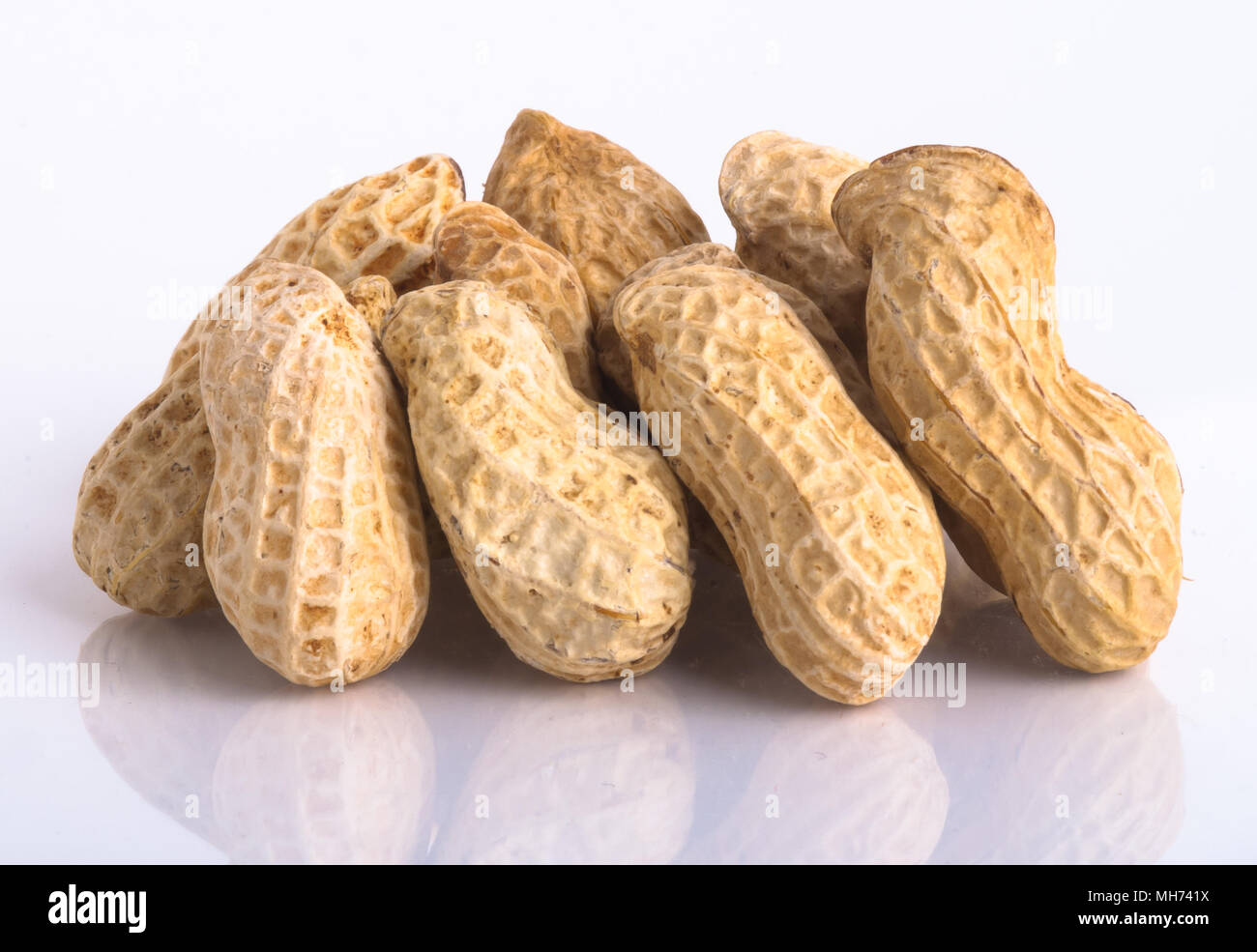 nuts on the white isolated background Stock Photo - Alamy