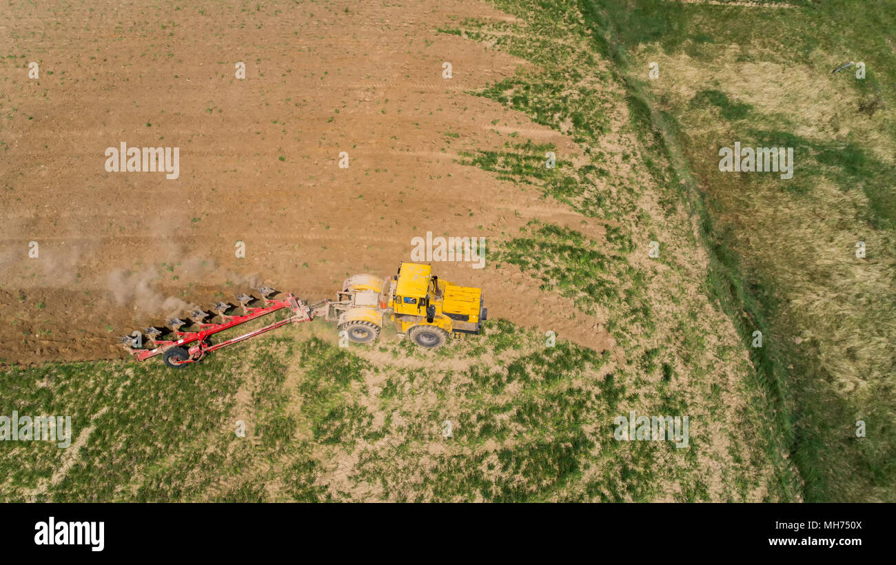 Aerial view of a tractor on a field Stock Photo - Alamy