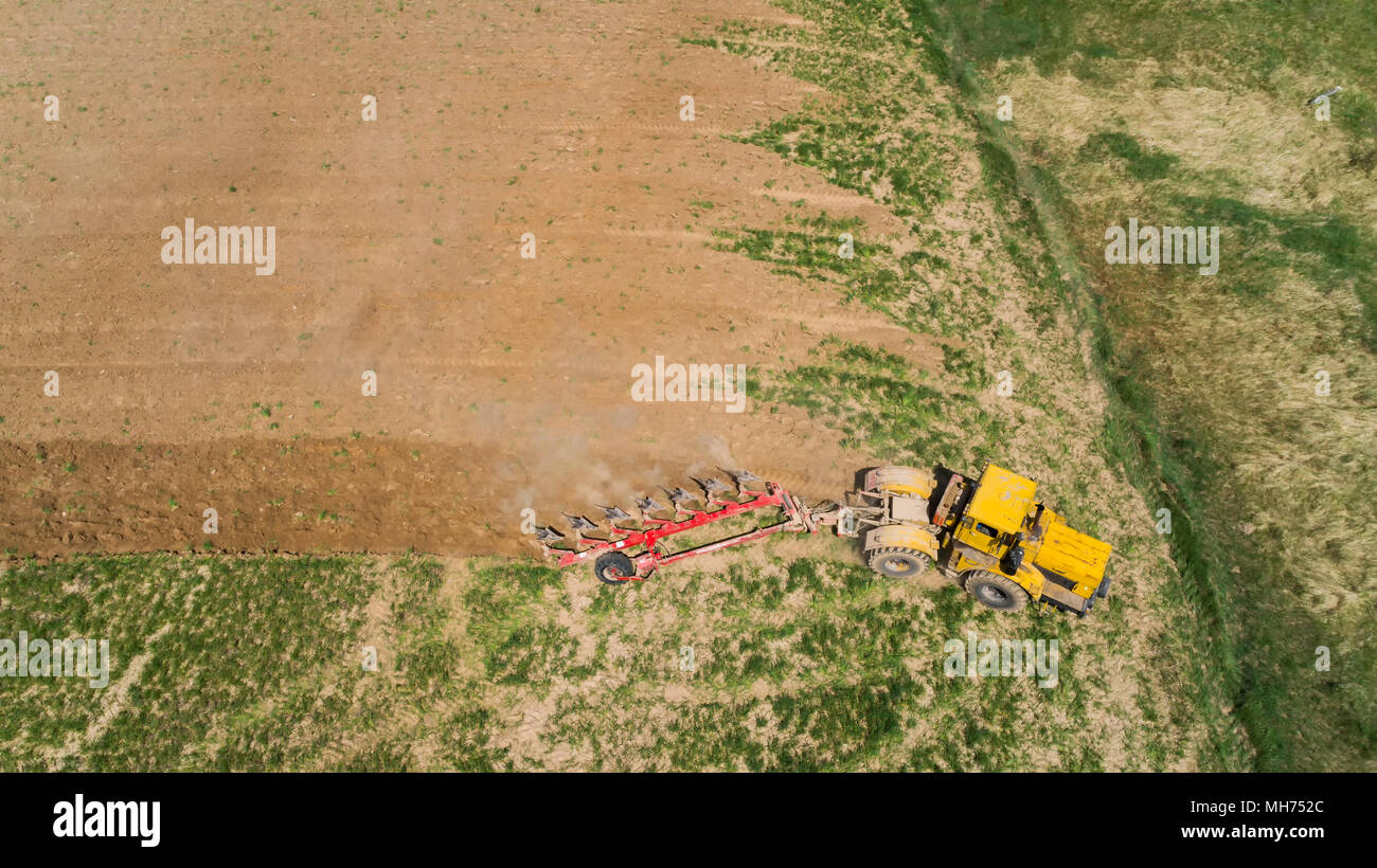 Aerial view of a tractor on a field Stock Photo - Alamy