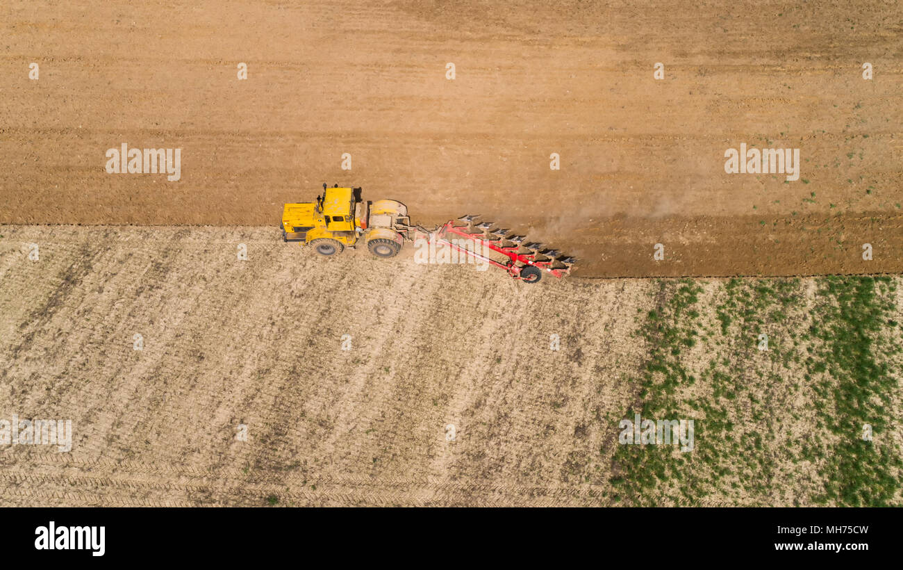 Aerial view of a tractor on a field Stock Photo - Alamy