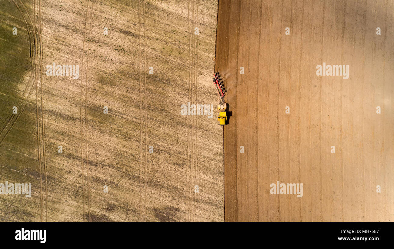 Aerial view of a tractor on a field Stock Photo - Alamy