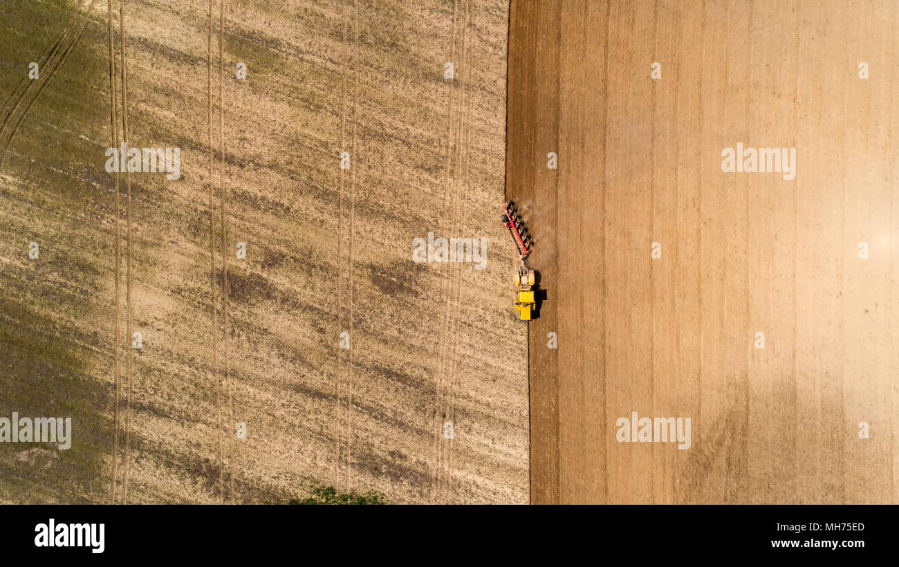 Aerial view of a tractor on a field Stock Photo - Alamy